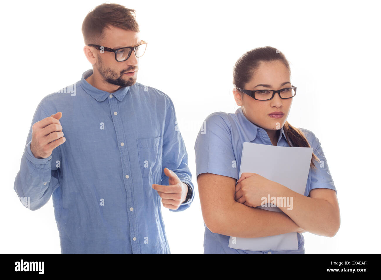Abusive work partner frightens female co-worker Stock Photo - Alamy