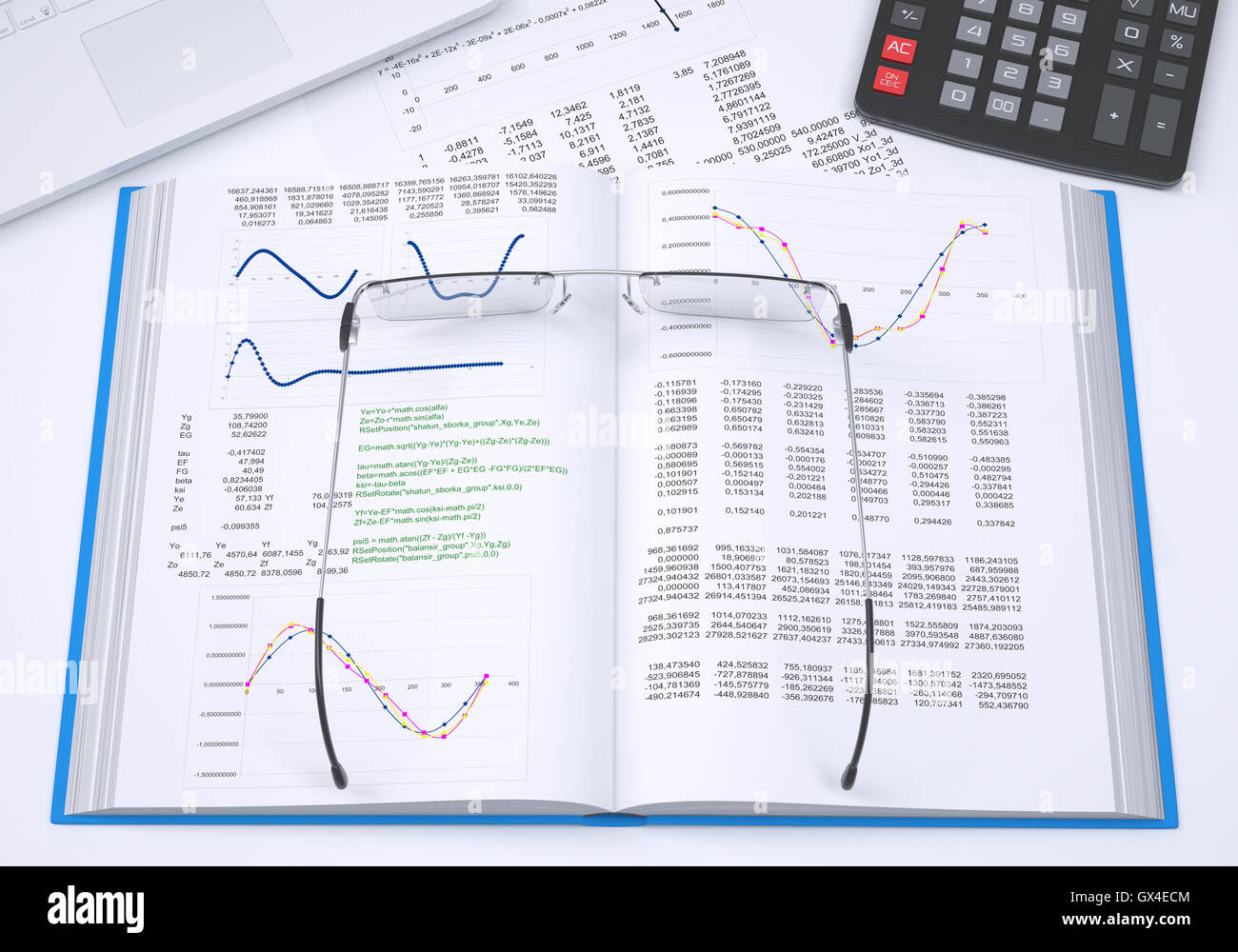 The book, calculator and paper charts Stock Photo - Alamy