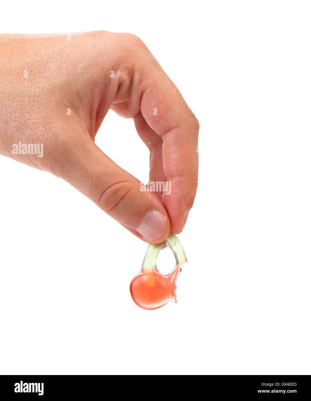 Hand hold fruit jelly in form of cherries Stock Photo - Alamy