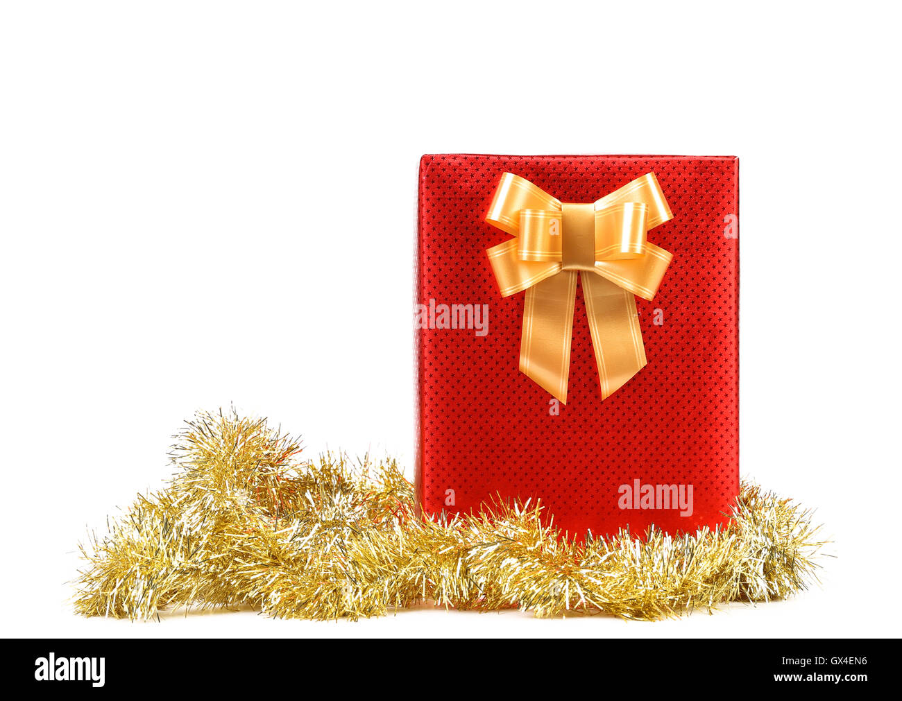 Red present box with spots and golden bow Stock Photo - Alamy