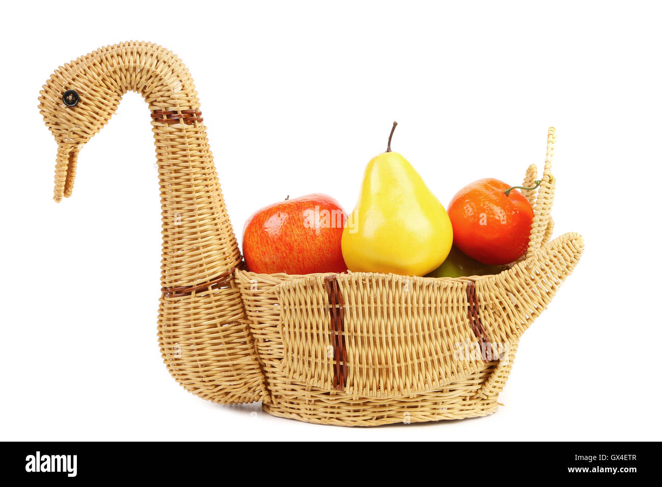 Basket swan with decorative fruits Stock Photo - Alamy