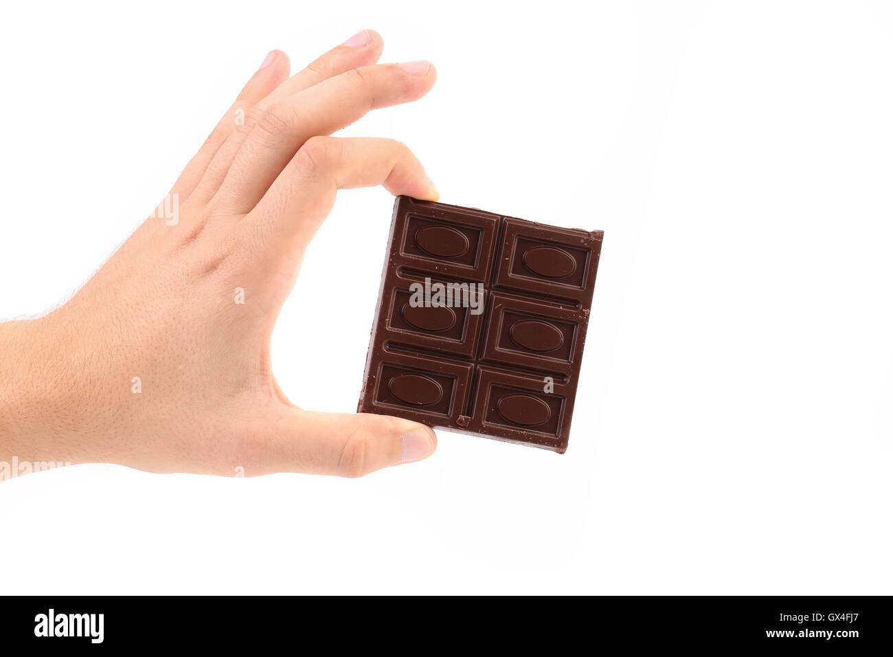 Hand holds chocolate bar hi-res stock photography and images - Alamy