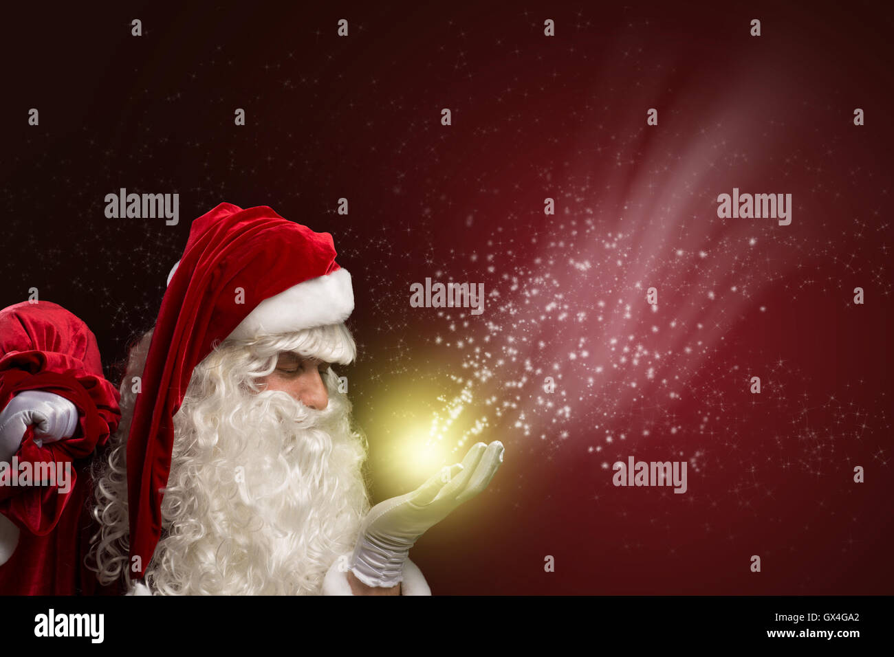 Santa Claus and the magic Stock Photo - Alamy