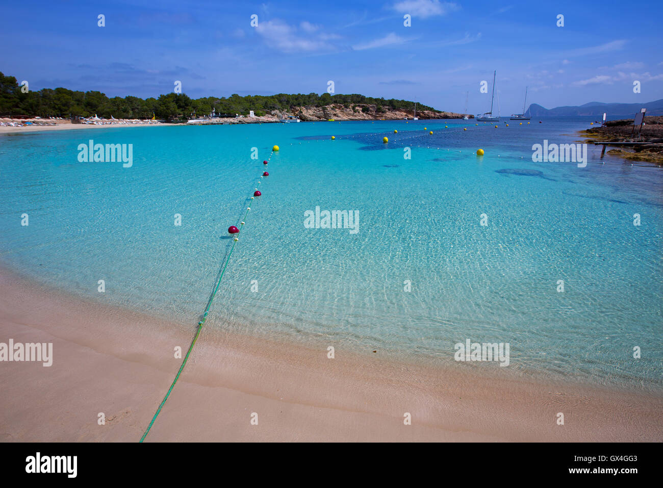 Ibiza Cala Bassa beach with turquoise Mediterranean Stock Photo - Alamy
