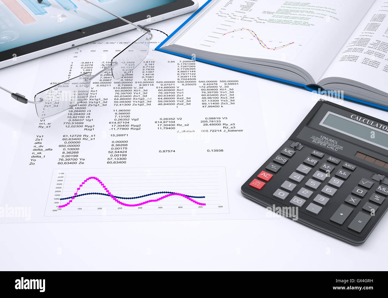 The book, calculator and paper charts Stock Photo - Alamy