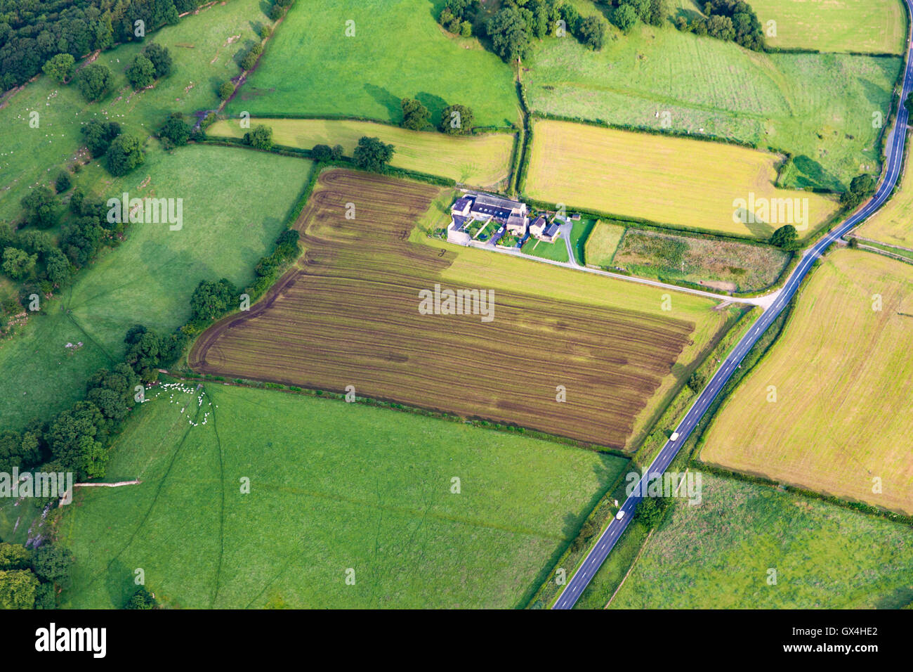 Aerial image of farm in North Yorkshire, England from a hot air balloon ...