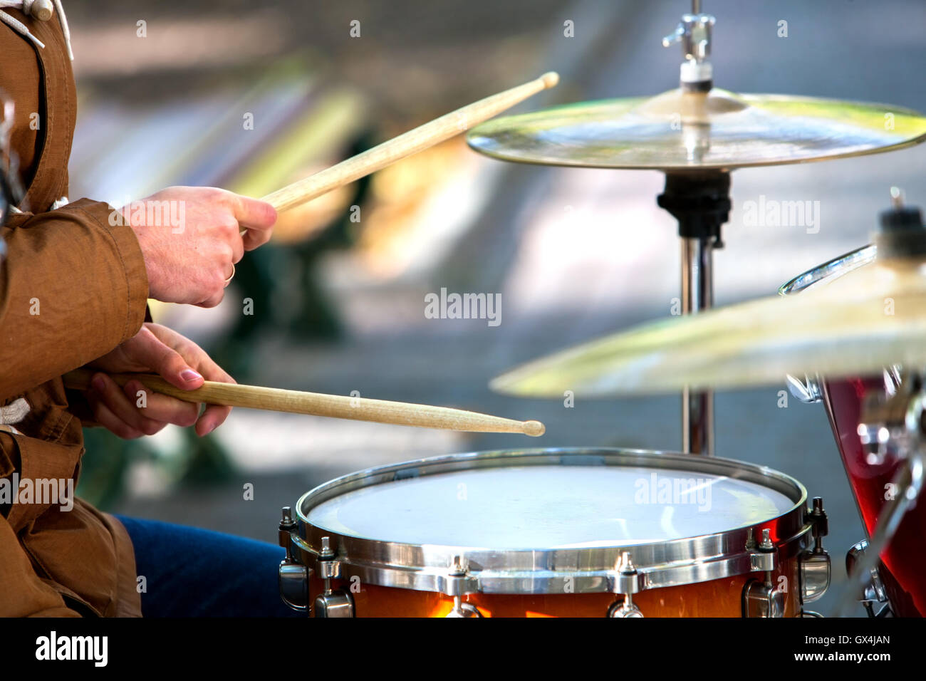 Hands of performance street musicians Stock Photo - Alamy
