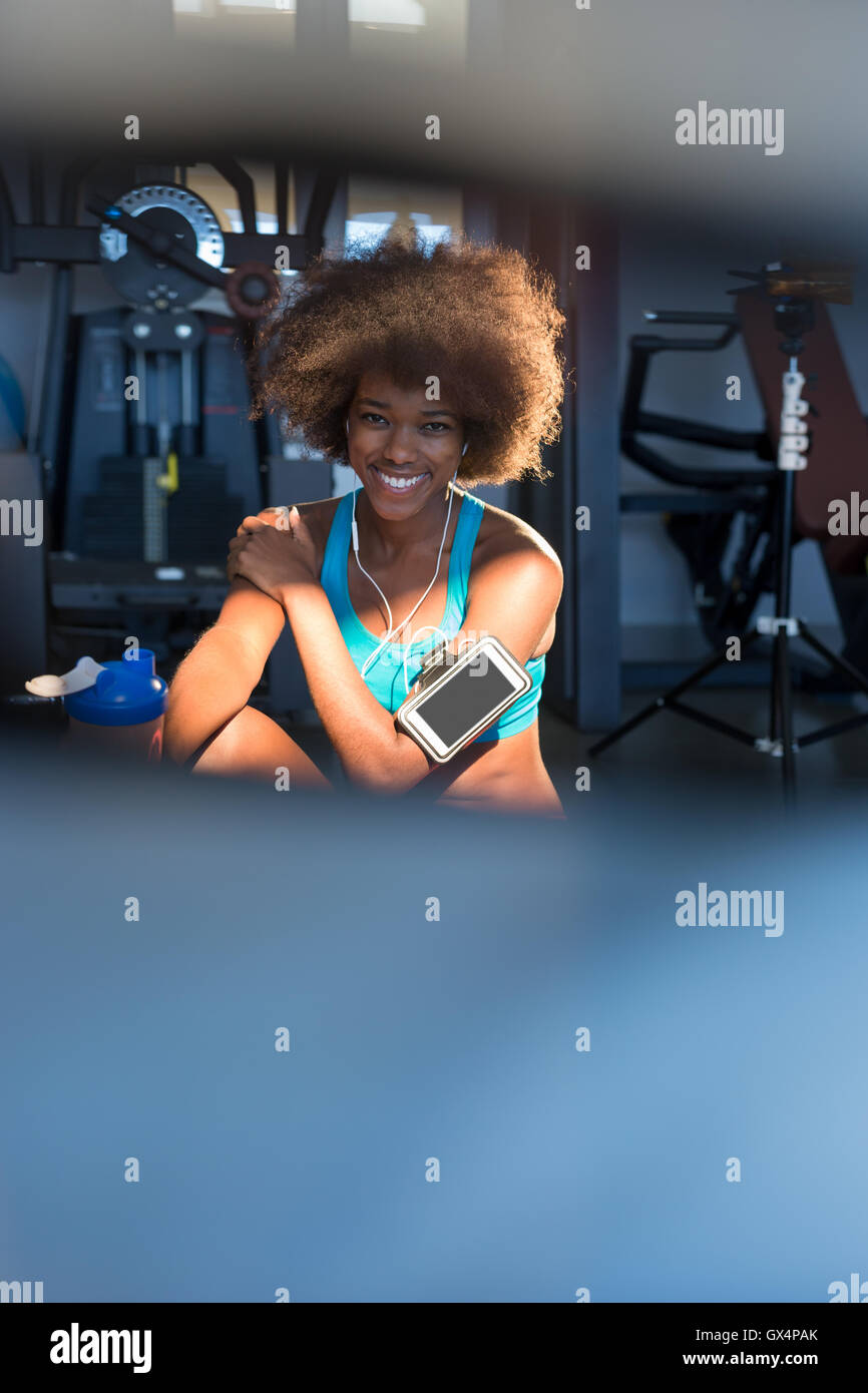 Girl resting after hard workout at the gym Stock Photo - Alamy