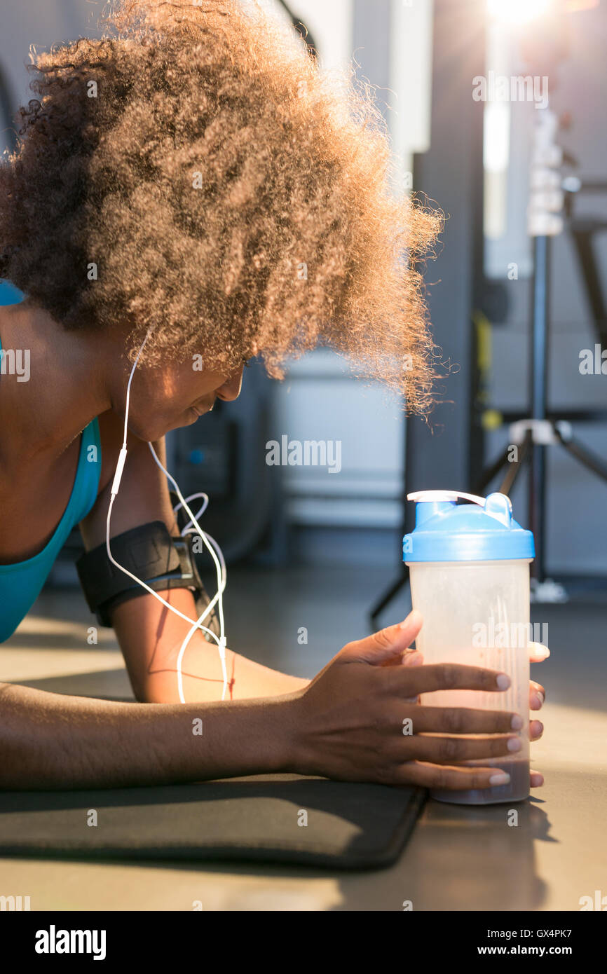 Girl resting after hard workout at the gym Stock Photo - Alamy