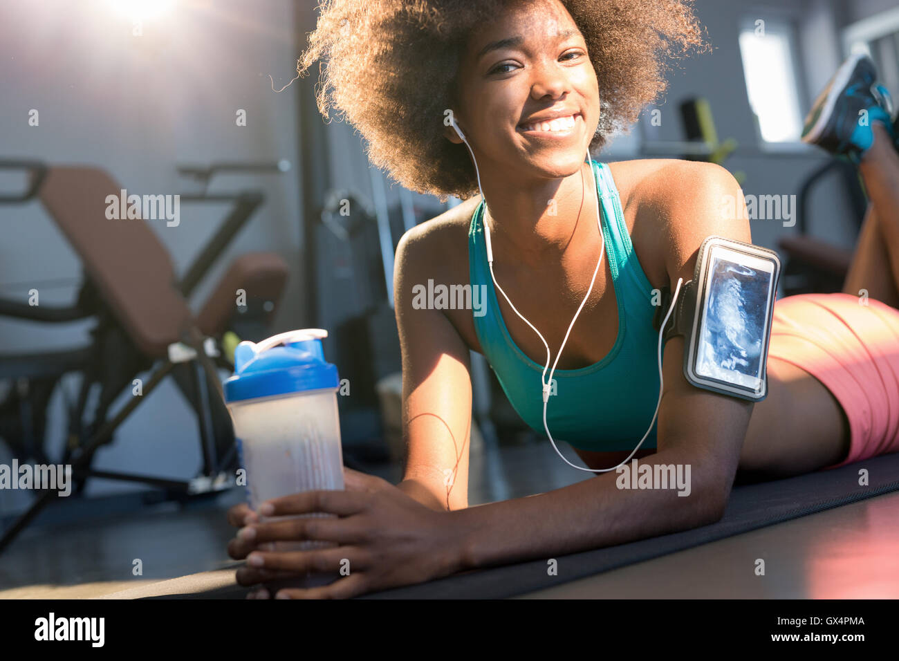 Girl resting after hard workout at the gym Stock Photo - Alamy
