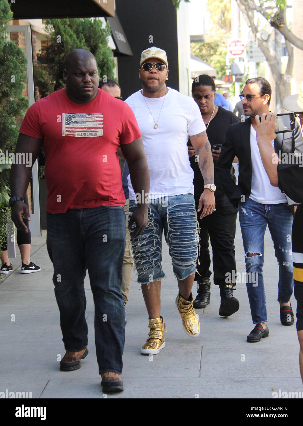 Flo Rida out and about with his friends on a sunny day Featuring: flo ...