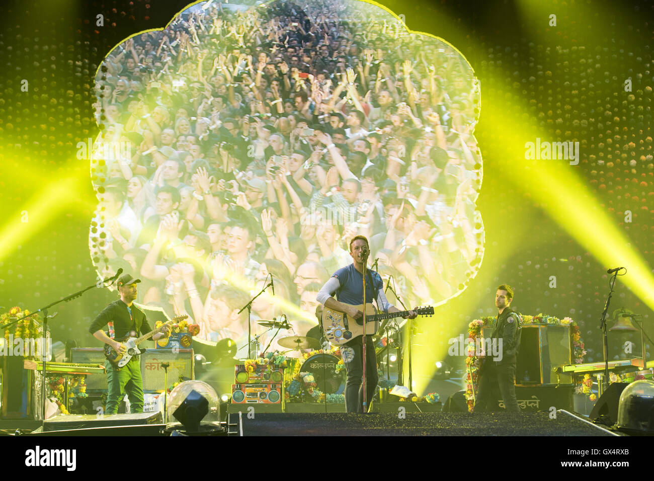 Chris martin of coldplay performs at wembley stadium hi-res stock ...