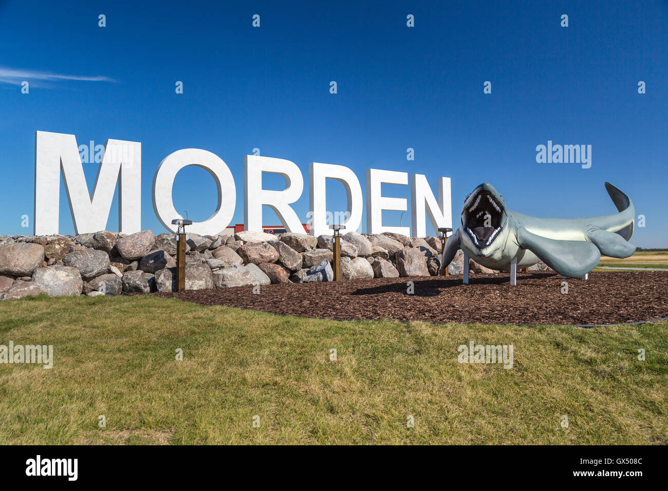 The City of Morden sign with mosasaur Bruce at the east entrance to the ...