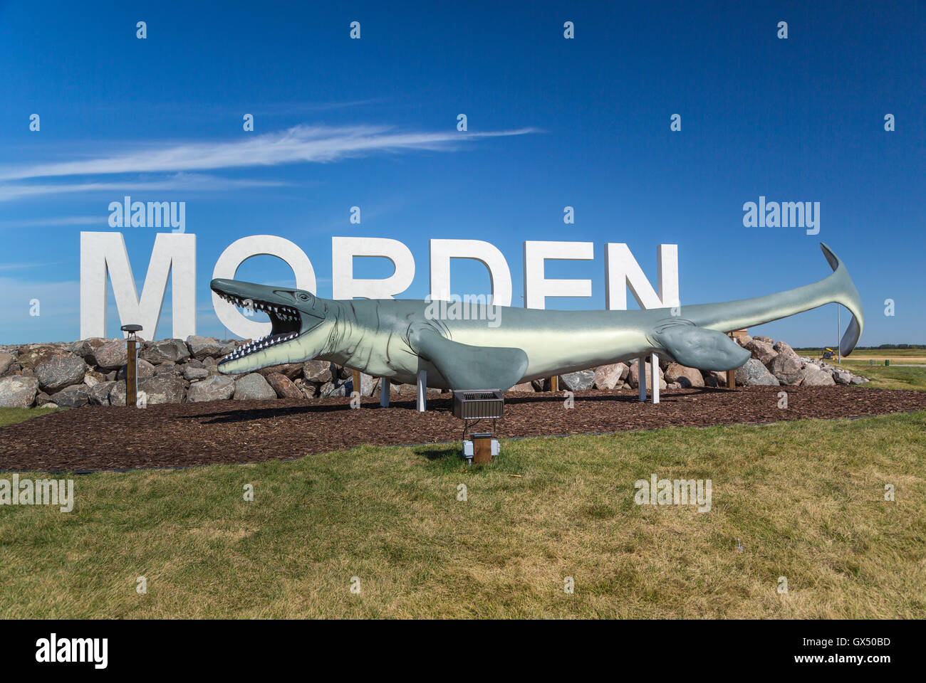 The City of Morden sign with mosasaur Bruce at the east entrance to the ...