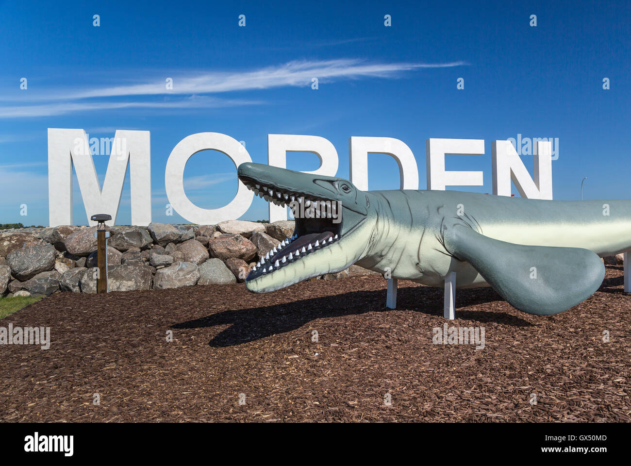 The City of Morden sign with mosasaur Bruce at the east entrance to the ...