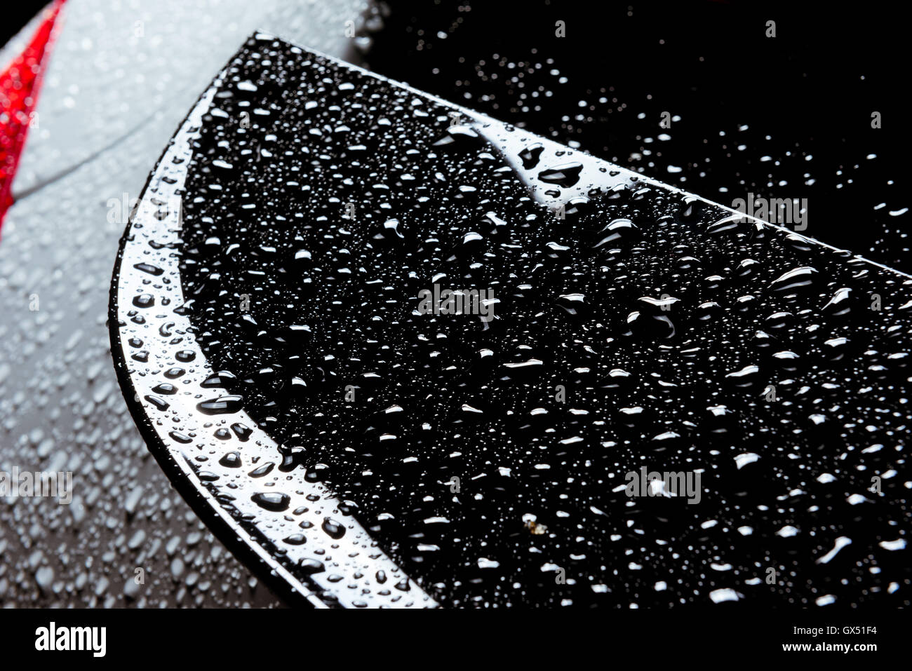 Rain drops on red car hi-res stock photography and images - Alamy