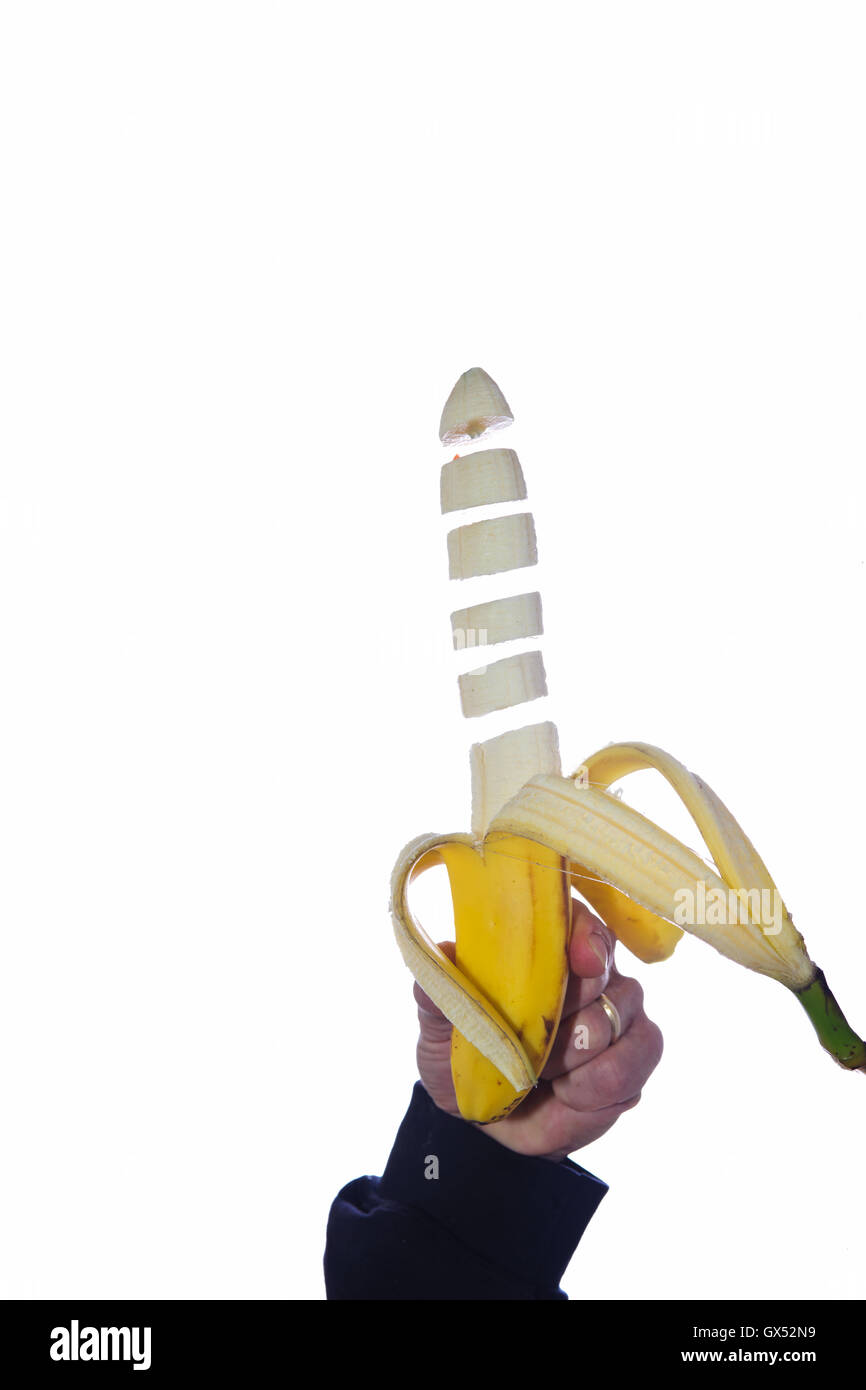 Sliced banana pieces floating in air Stock Photo - Alamy