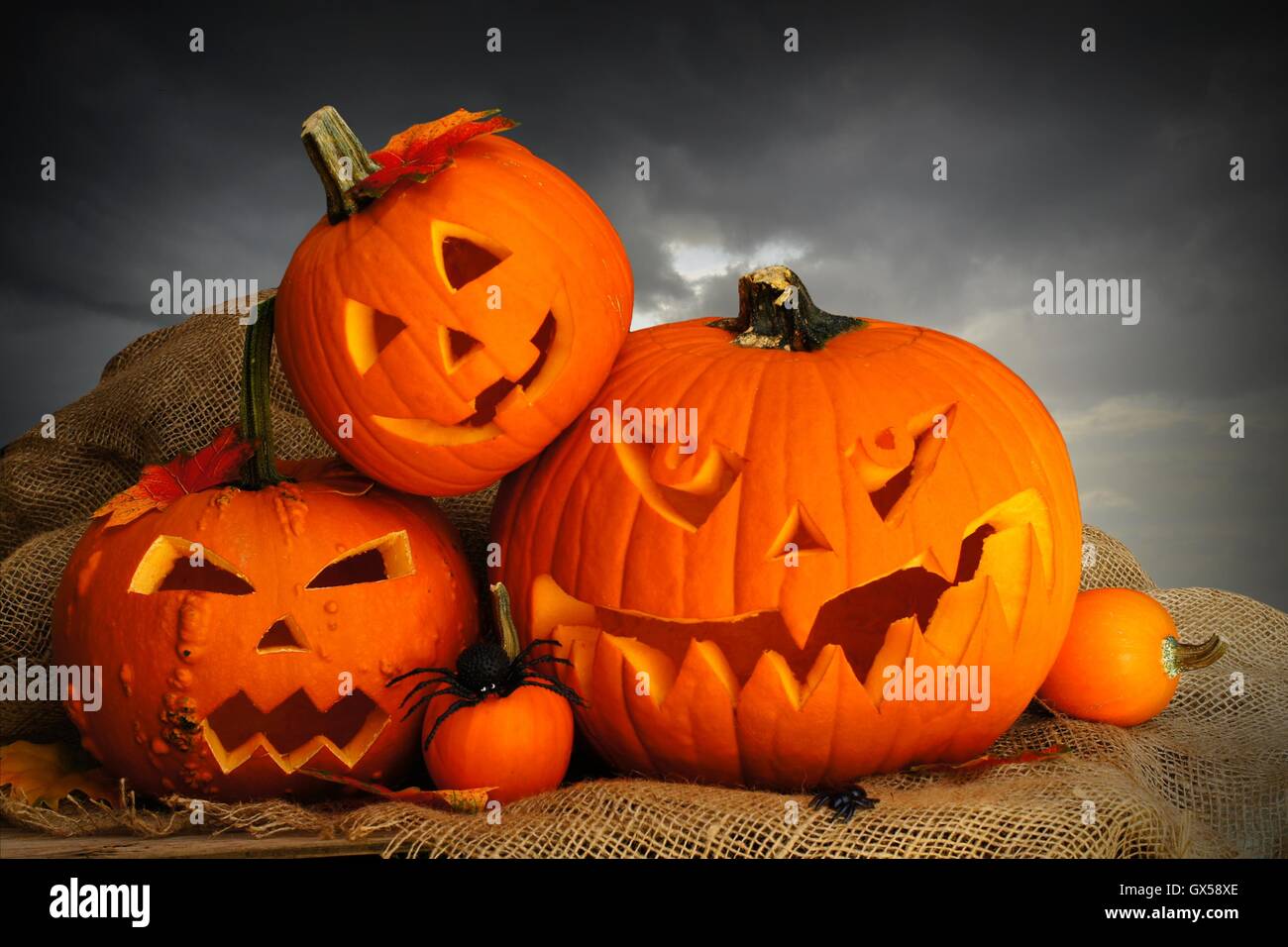 Halloween Jack o Lanterns with dark cloud background Stock Photo - Alamy