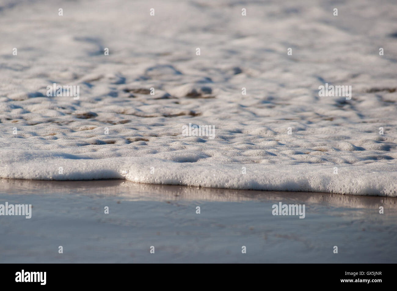 Water moving across the sand hi-res stock photography and images - Alamy