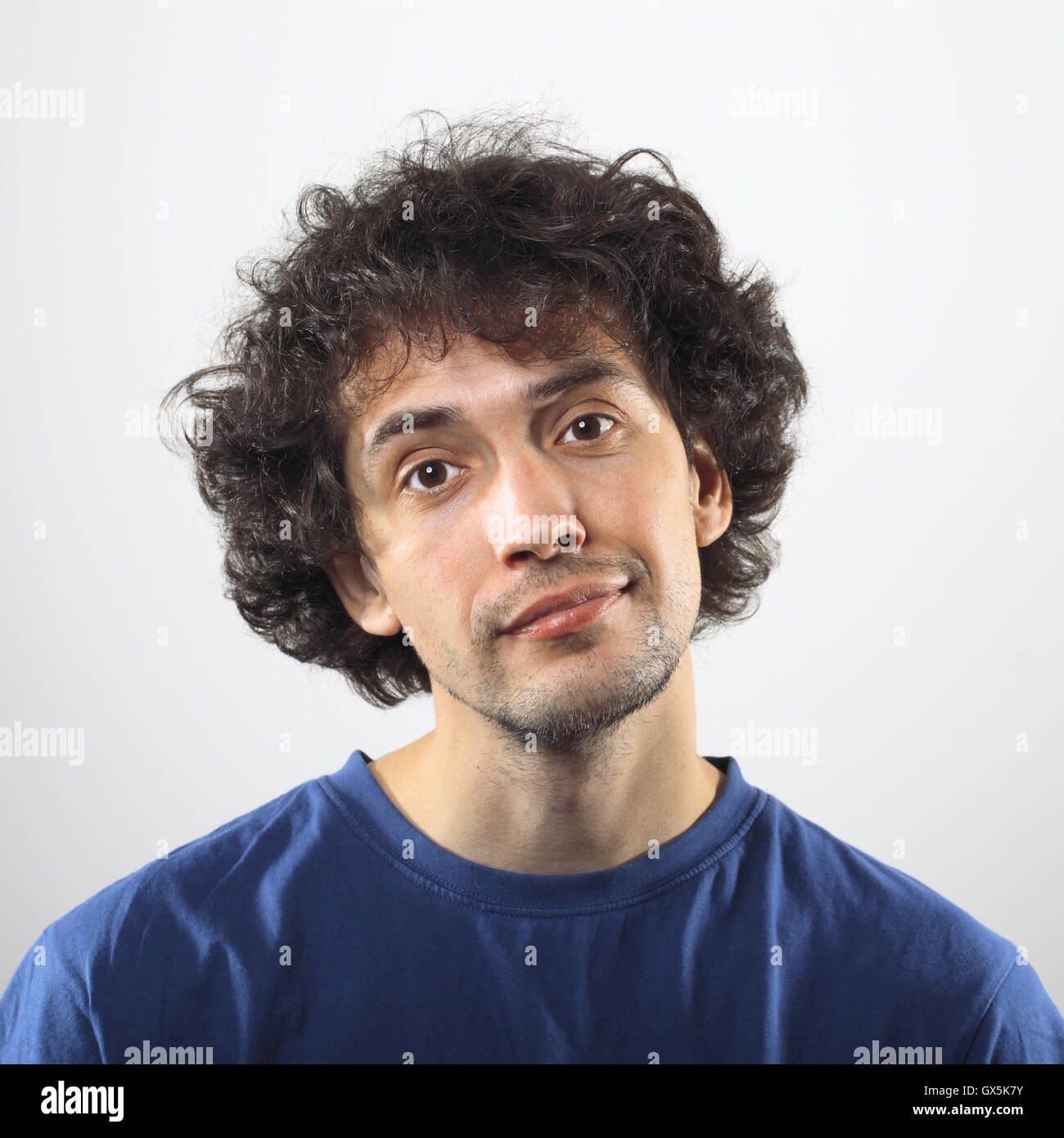 Portrait of cool, young men in blue shirt Stock Photo - Alamy