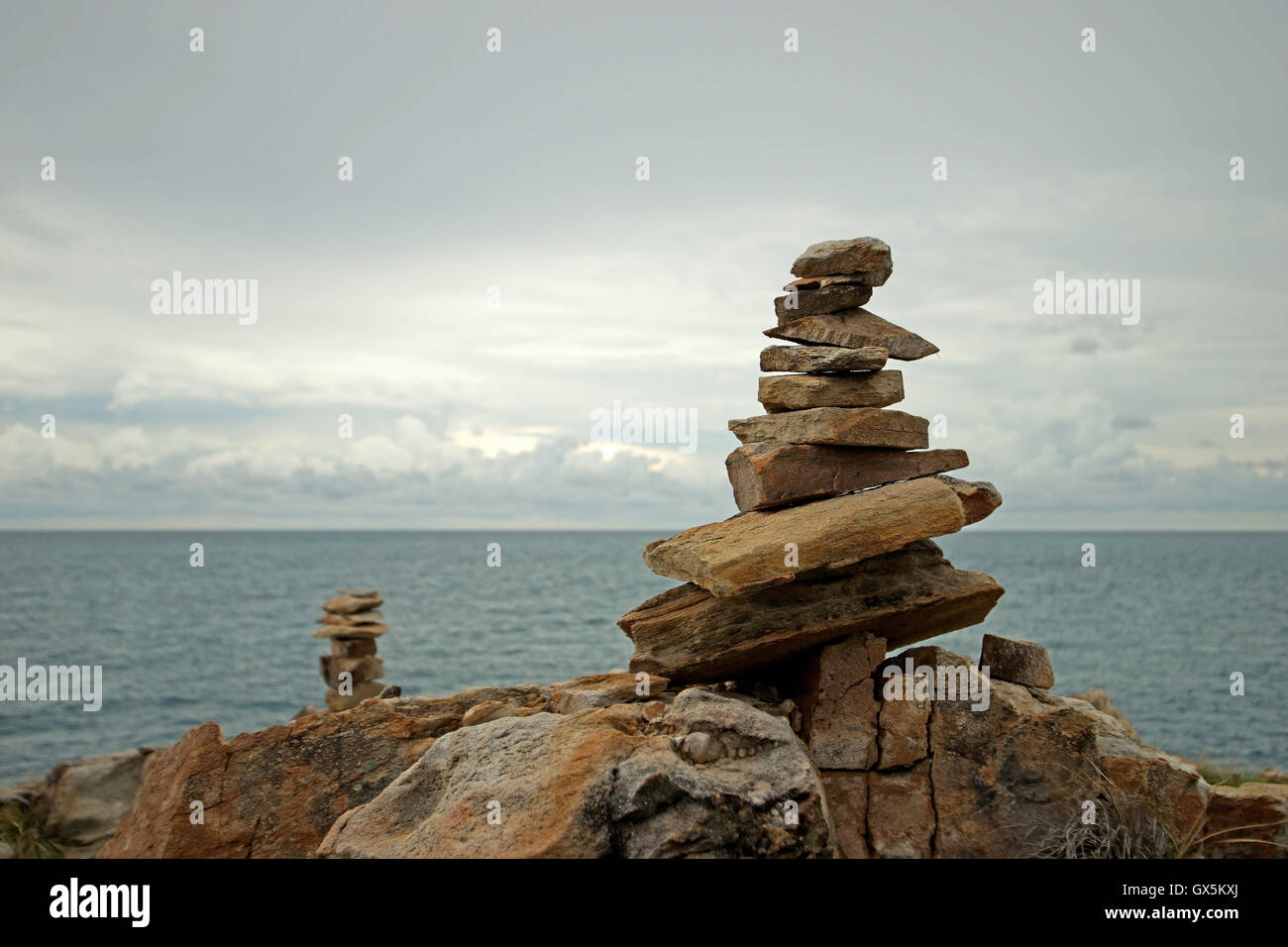 cairn, stack of stones on the sea coast Stock Photo - Alamy