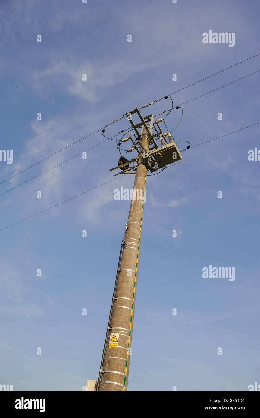 high voltage electrical pole structure on the meadow Stock Photo - Alamy