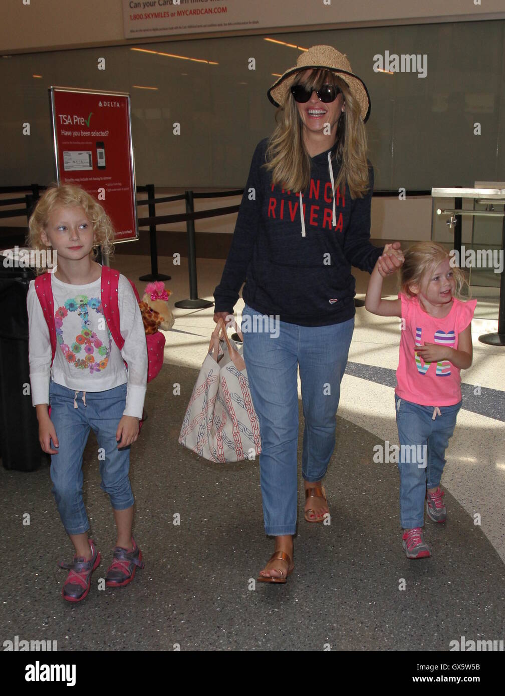 Eric Dane arrives at Los Angeles International Airport with his family ...