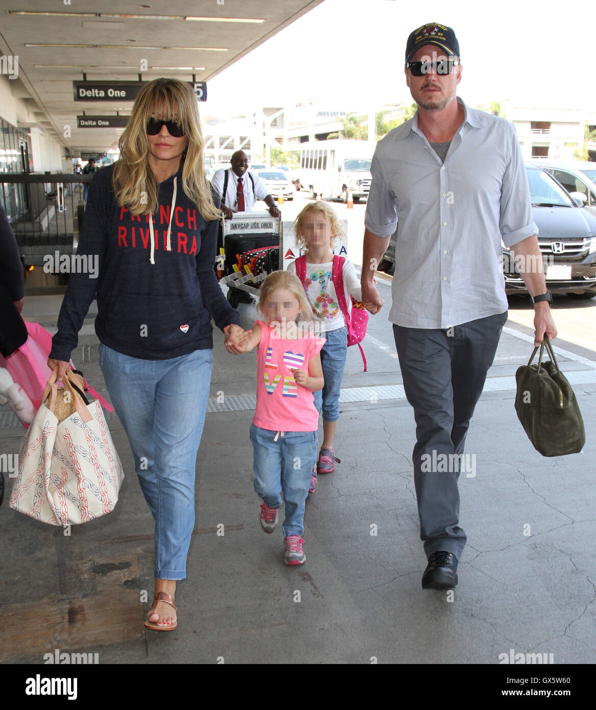 Eric Dane arrives at Los Angeles International Airport with his family ...