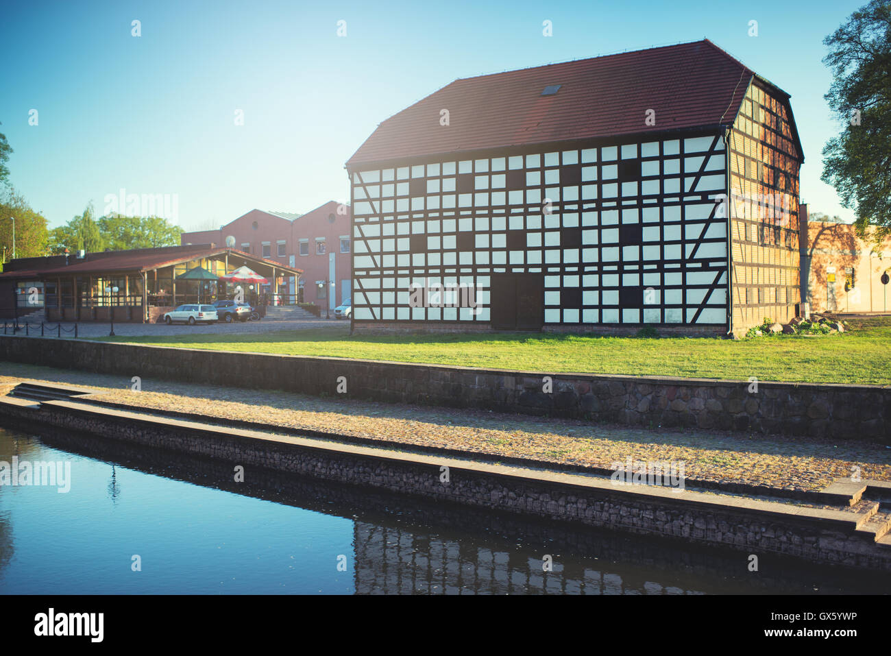 Small river in the city in spring Stock Photo - Alamy