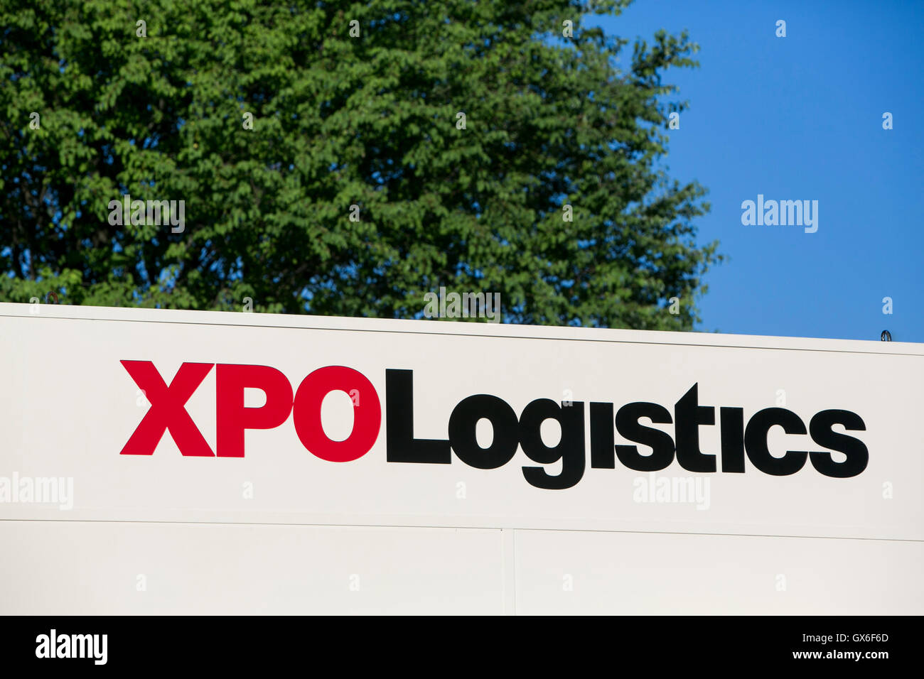 A logo sign outside of a facility occupied by XPO Logistics, Inc., in ...