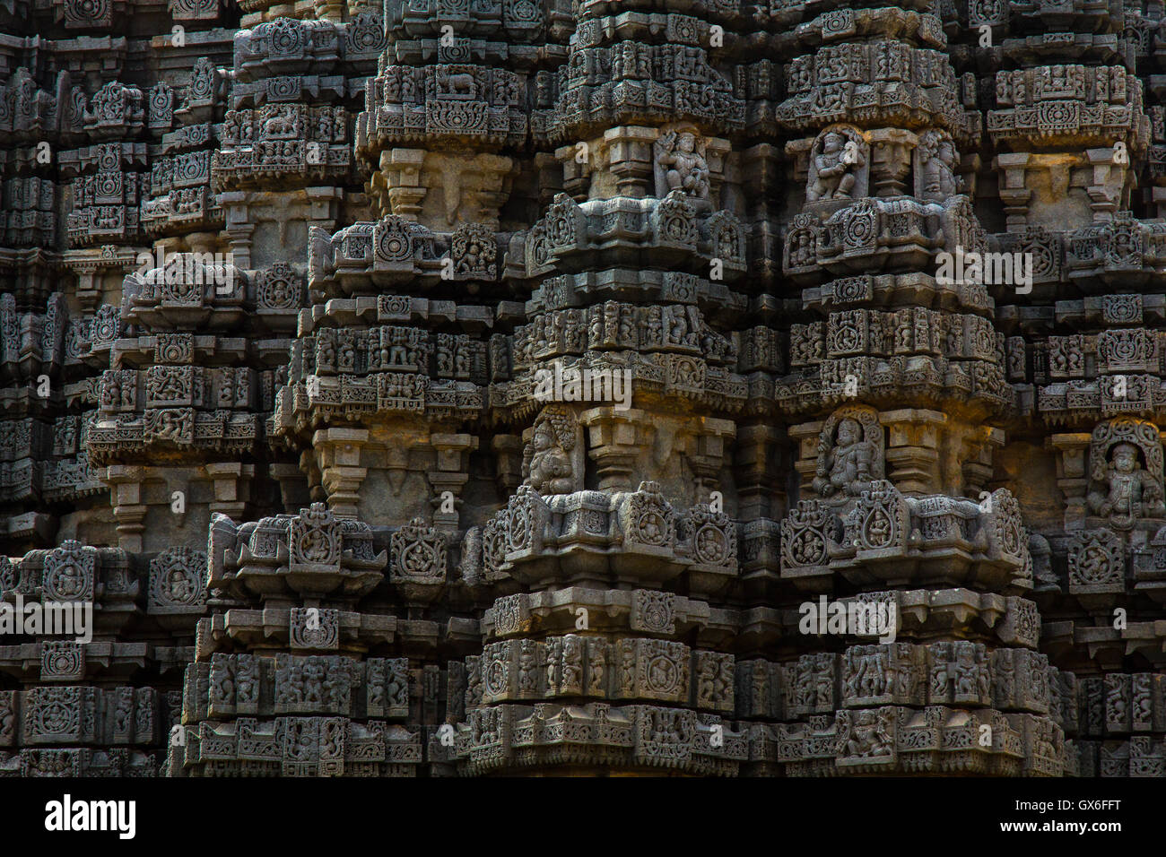 Relief carvings on tiered (tala) superstructure over the shrine (vimana ...