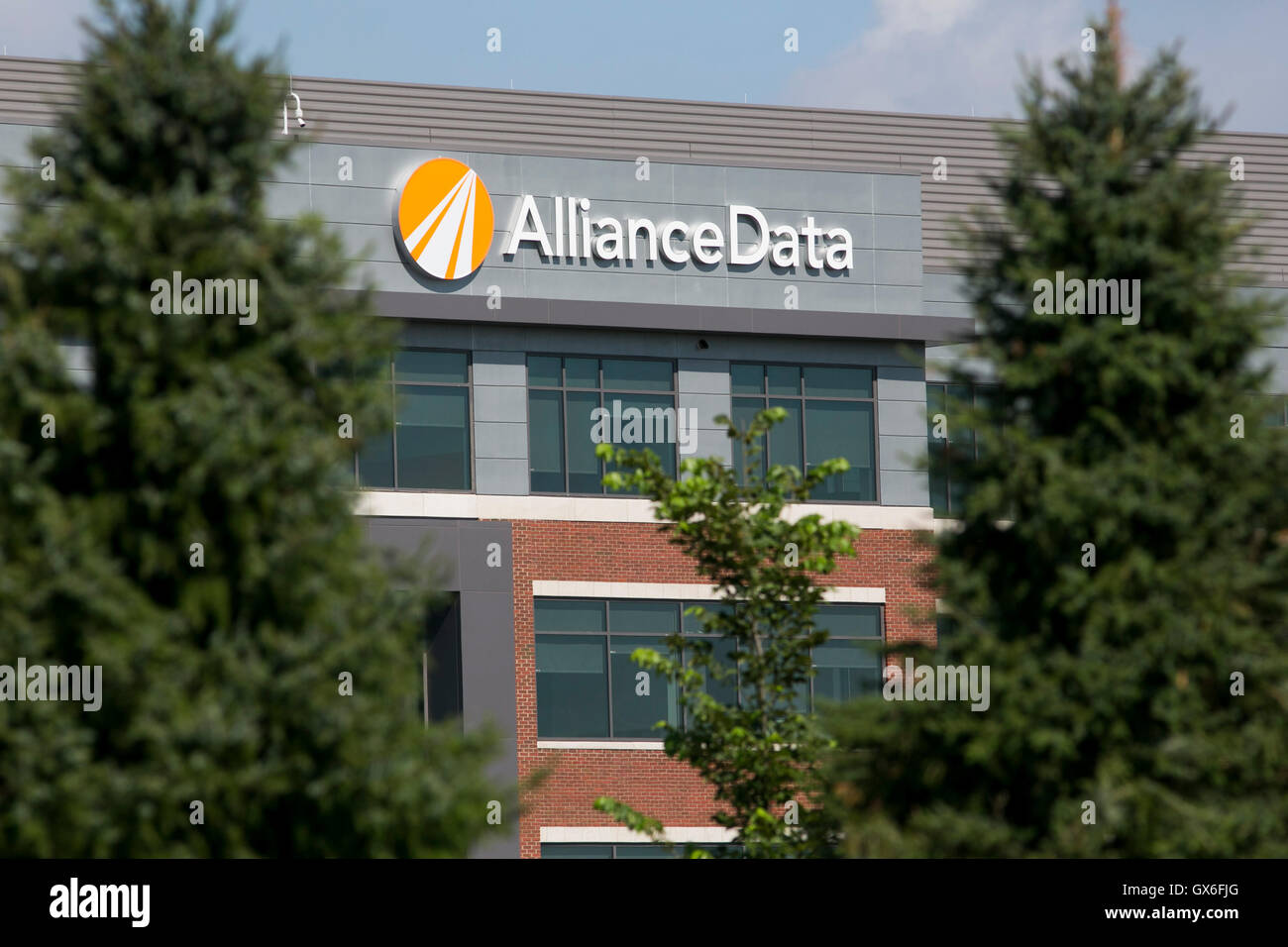 A logo sign outside of a facility occupied by the Alliance Data Systems ...