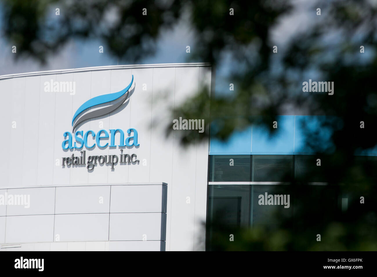 A logo sign outside of a facility occupied by Ascena Retail Group, Inc ...