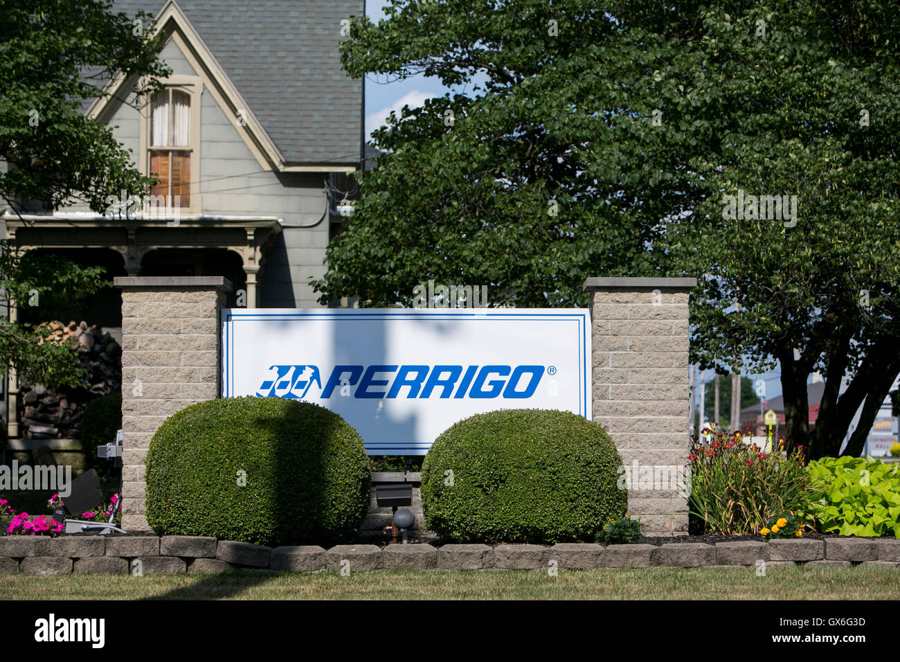 A logo sign outside of a facility occupied by the Perrigo Company in ...