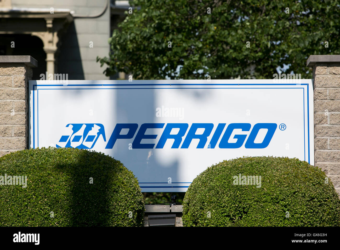A logo sign outside of a facility occupied by the Perrigo Company in ...