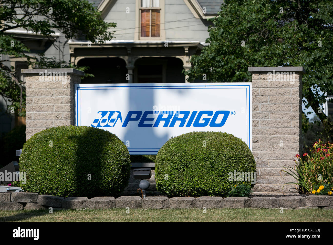 A logo sign outside of a facility occupied by the Perrigo Company in ...
