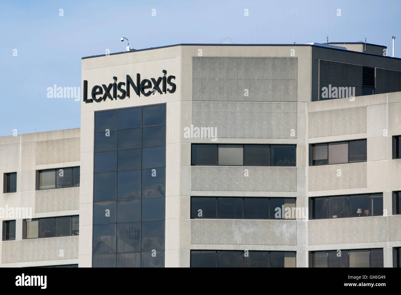 A logo sign outside of a facility occupied by the LexisNexis Group in ...