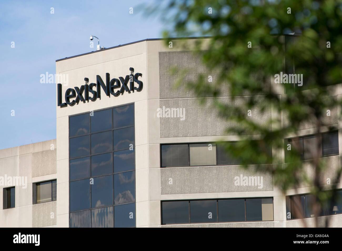 A logo sign outside of a facility occupied by the LexisNexis Group in ...