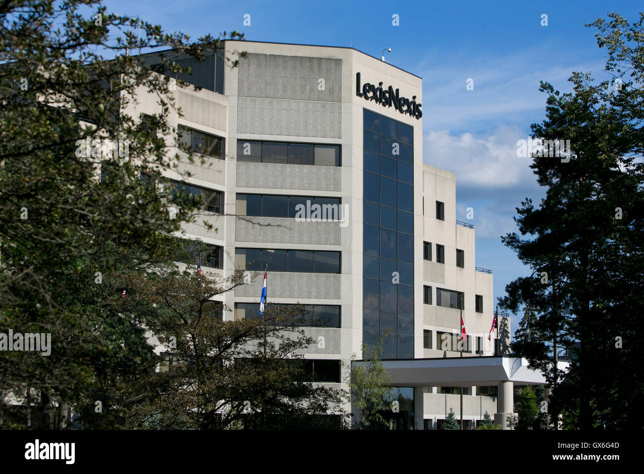 A logo sign outside of a facility occupied by the LexisNexis Group in ...