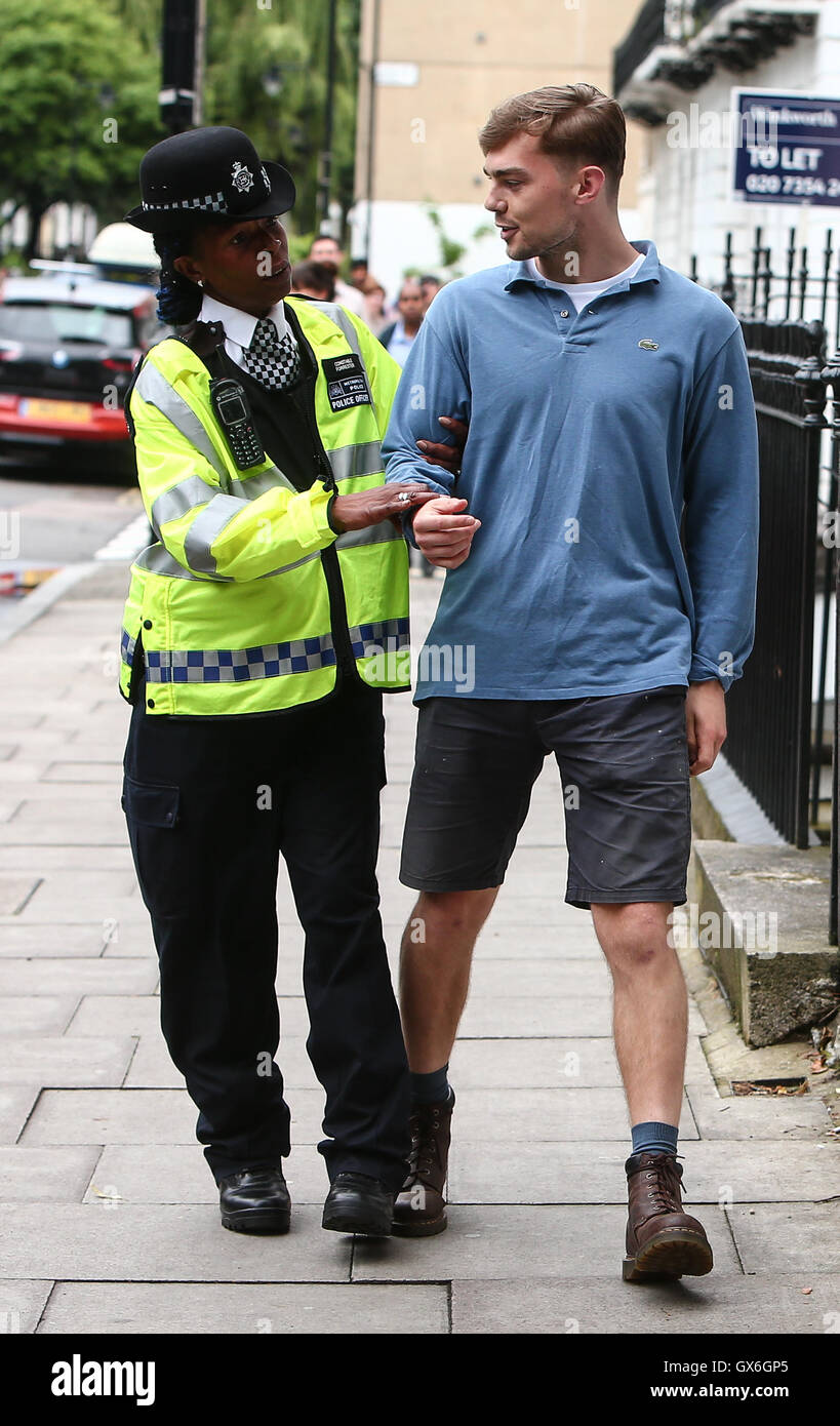 Police keep watch at Boris Johnson's house after a few Remain stickers ...