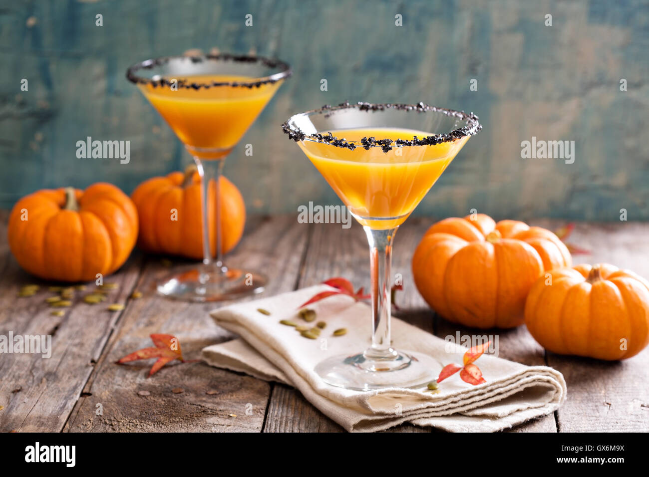 Pumpkin martini cocktail with black salt rim Stock Photo - Alamy