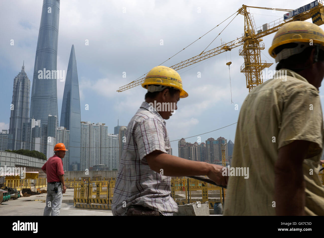 Chinese workers work in a construction site in Shanghai, China. 12-Sep ...