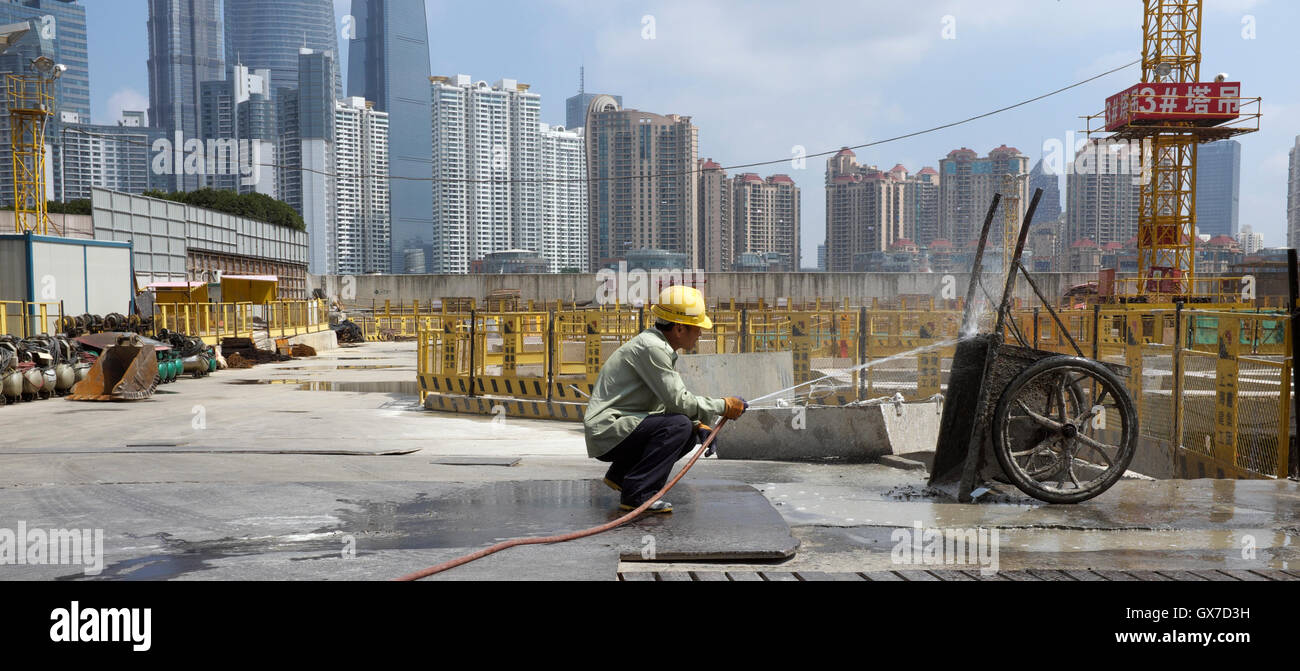Chinese workers work in a construction site in Shanghai, China. 12-Sep ...