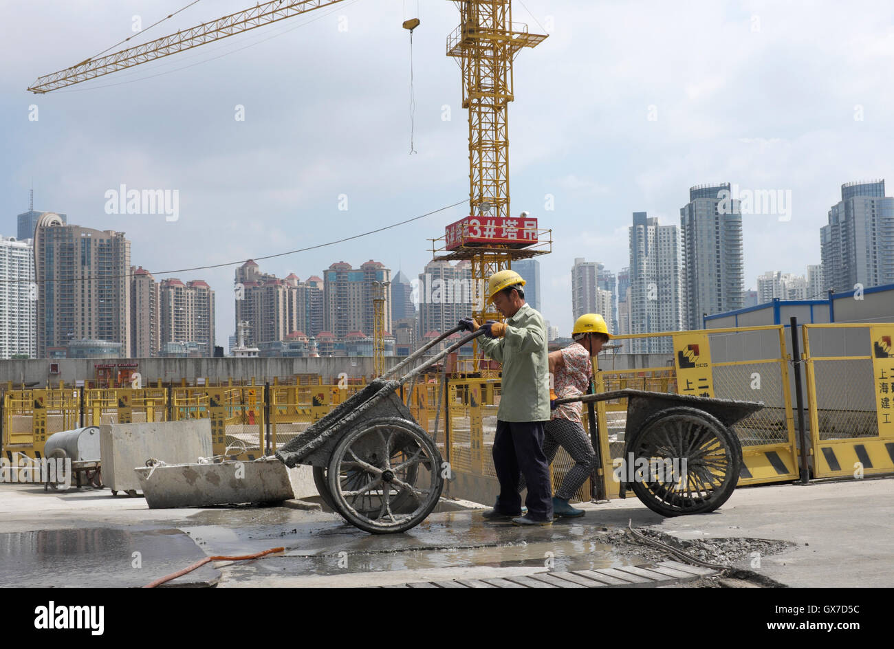 Chinese workers work in a construction site in Shanghai, China. 12-Sep ...