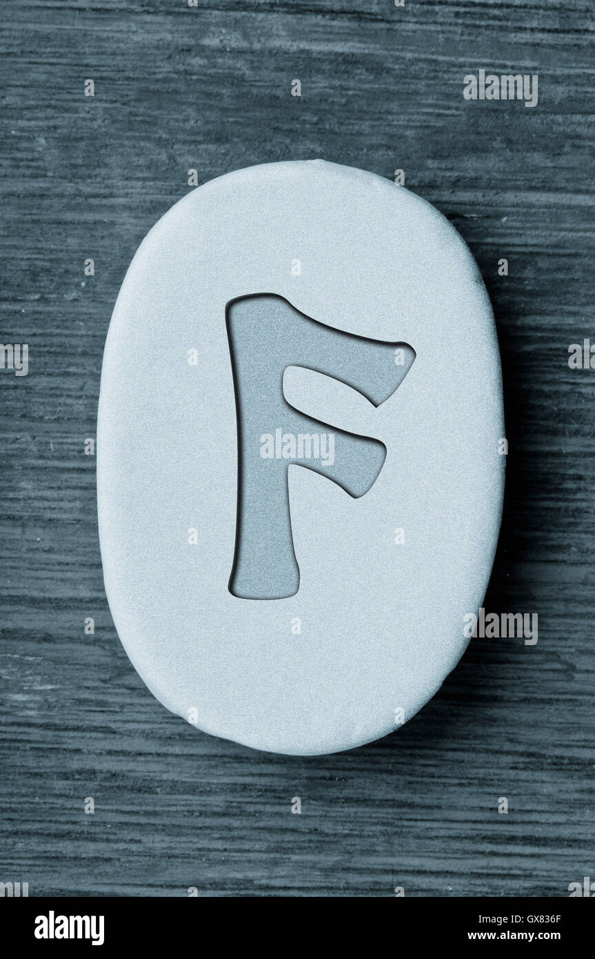 rune symbol Ansuz on stone Stock Photo - Alamy