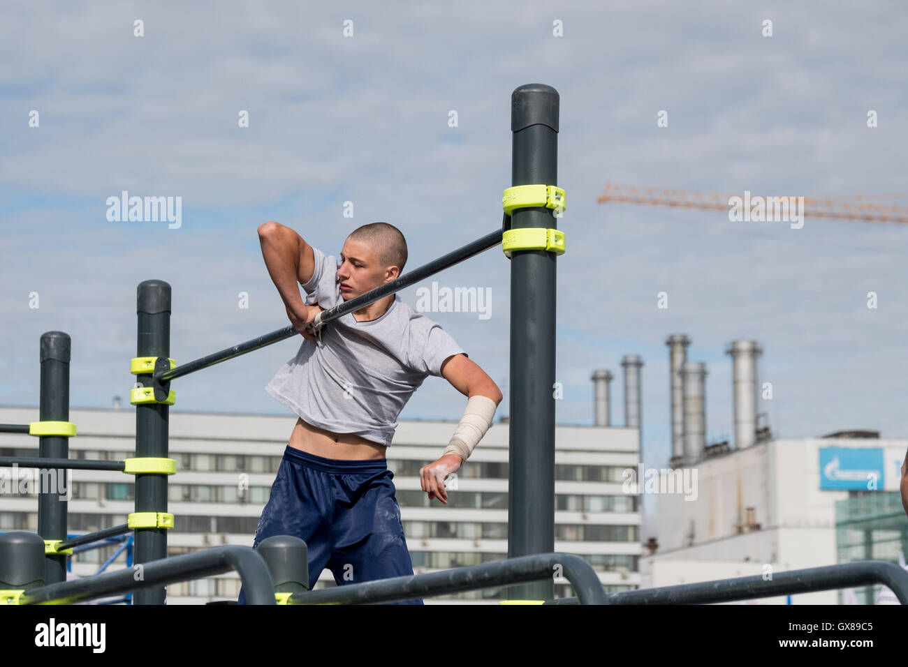Moscow, Russia - September 10, 2016: Young man practice street workout ...