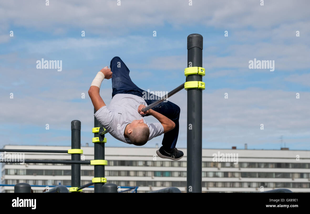 Moscow, Russia - September 10, 2016: Young man practice street workout ...