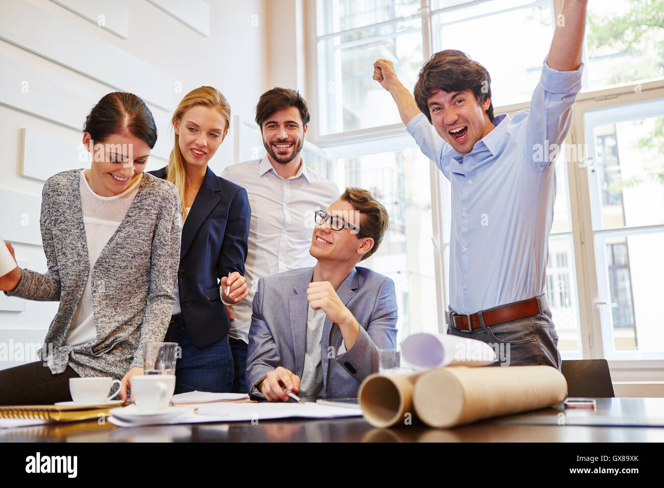Business people celebrating success in hi-res stock photography and ...