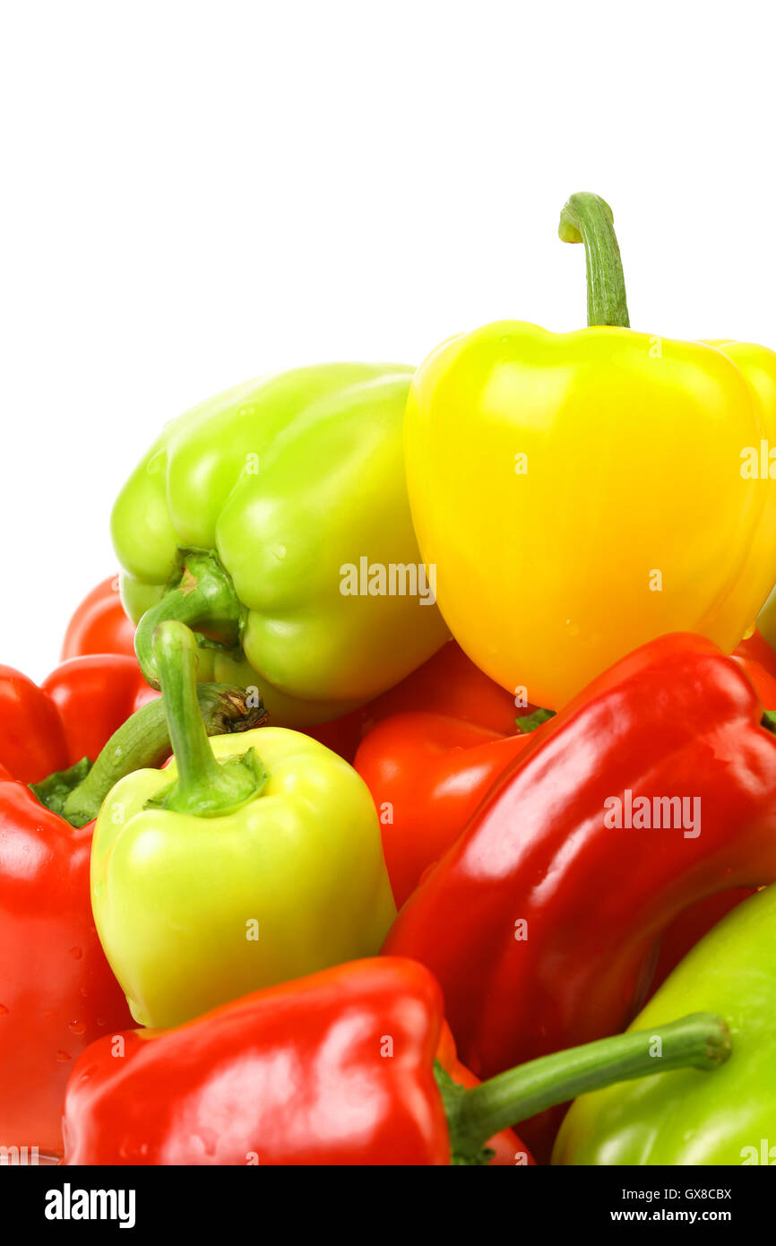 Multi-colour peppers on a white background Stock Photo - Alamy