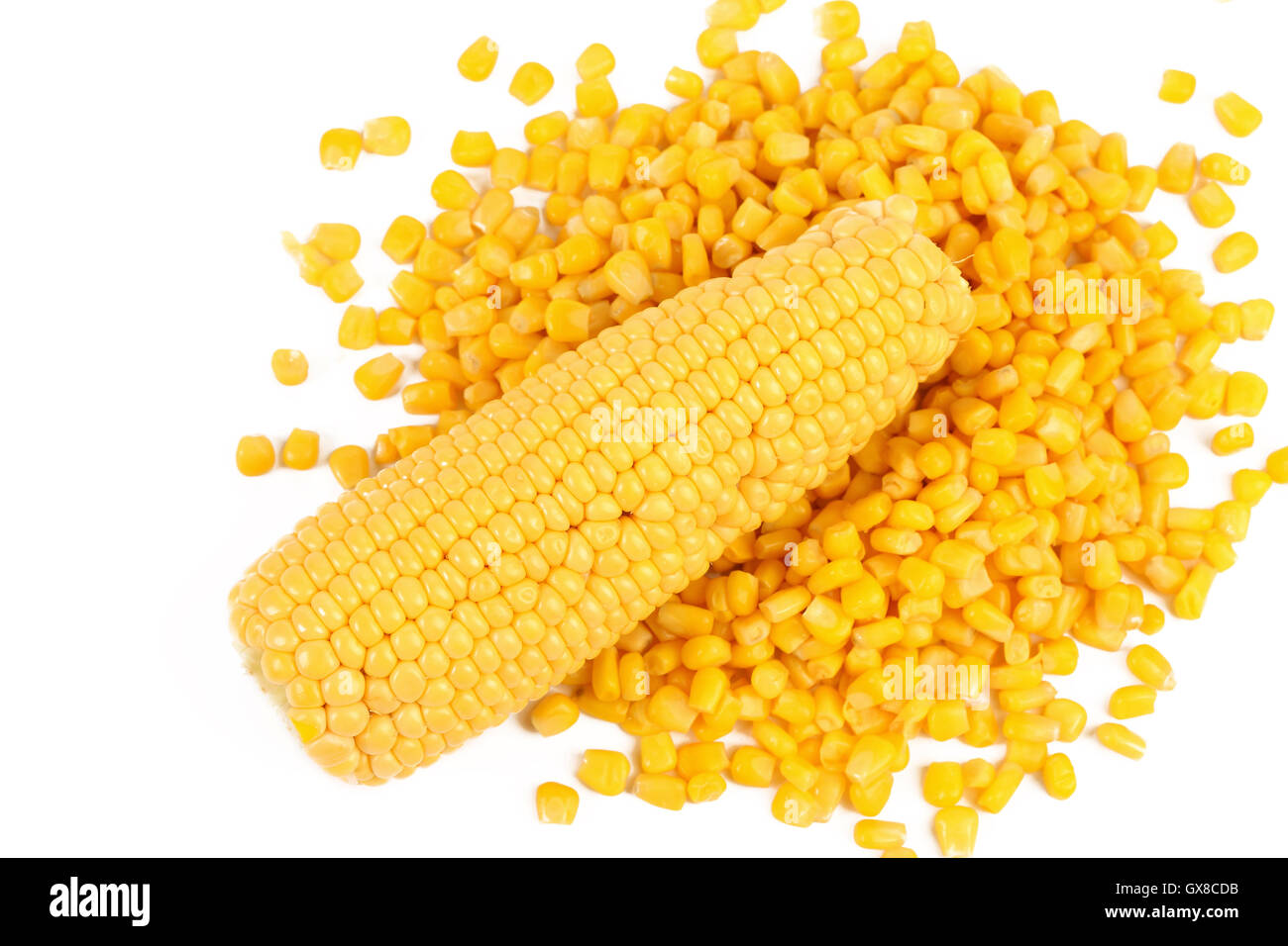 Corncob on a bulk of corn grains Stock Photo - Alamy